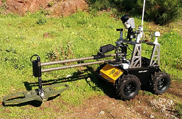 Landmine-detecting Husky Robot For Safe Minesweeping In War Torn Areas